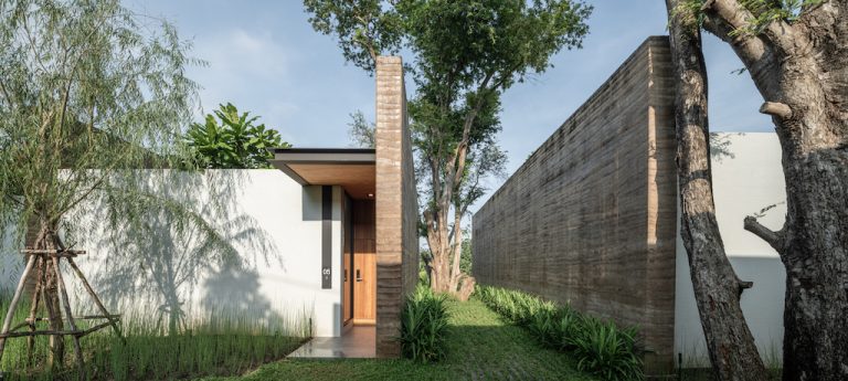 IDIN Architects designs boutique hotel along Kwai River using rammed ...