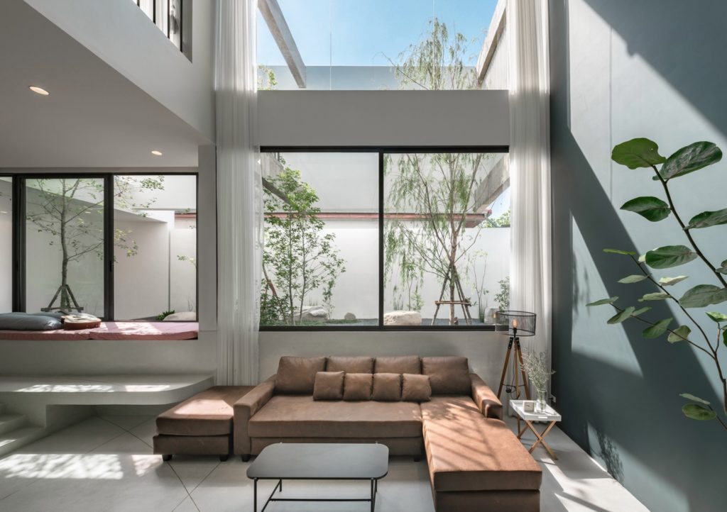 Inly Studio designs curved double-walled house in Chiang Mai to ...